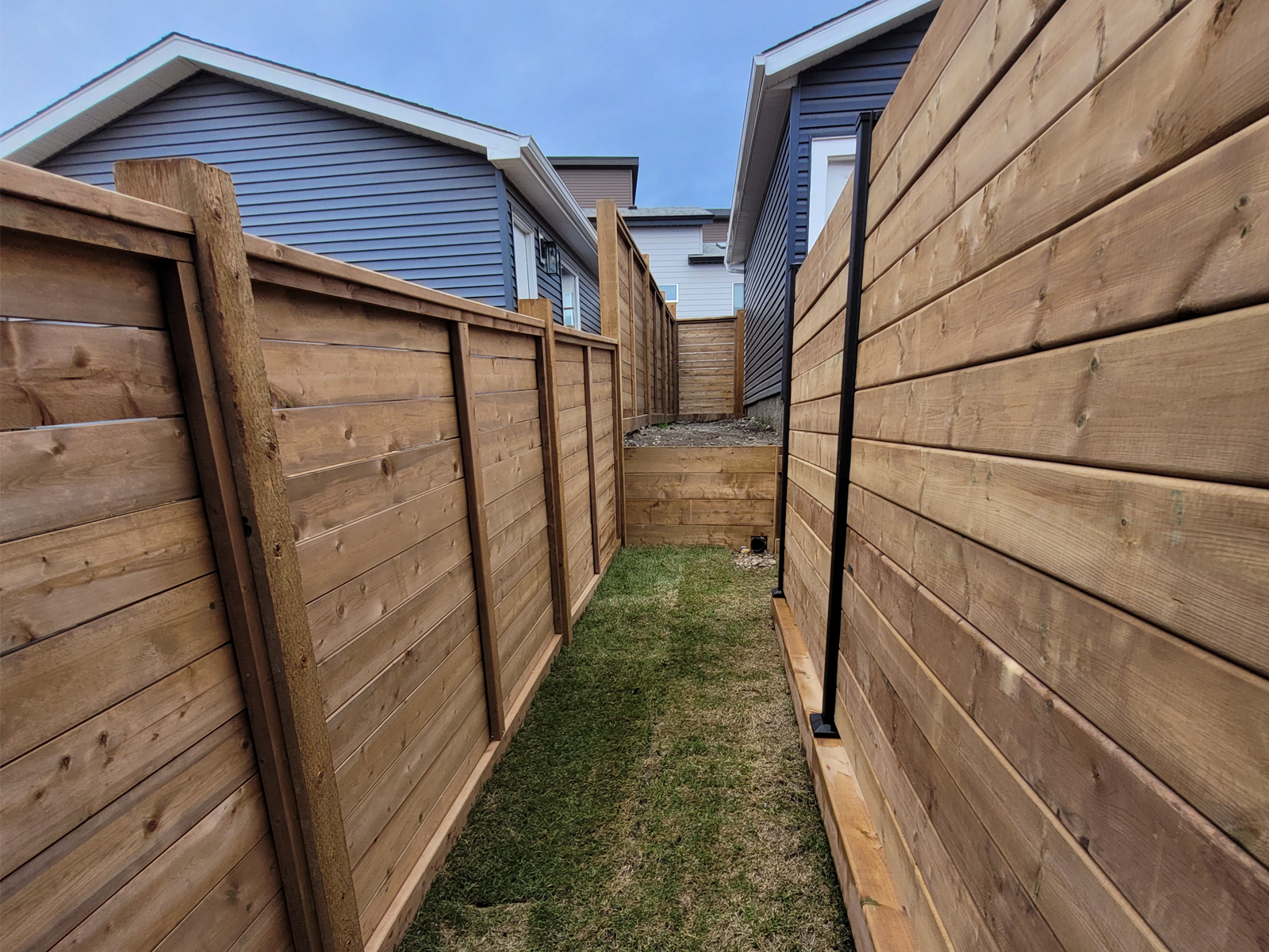 Custom Privacy & Security Fences in Alberta | Falcon Contracting
